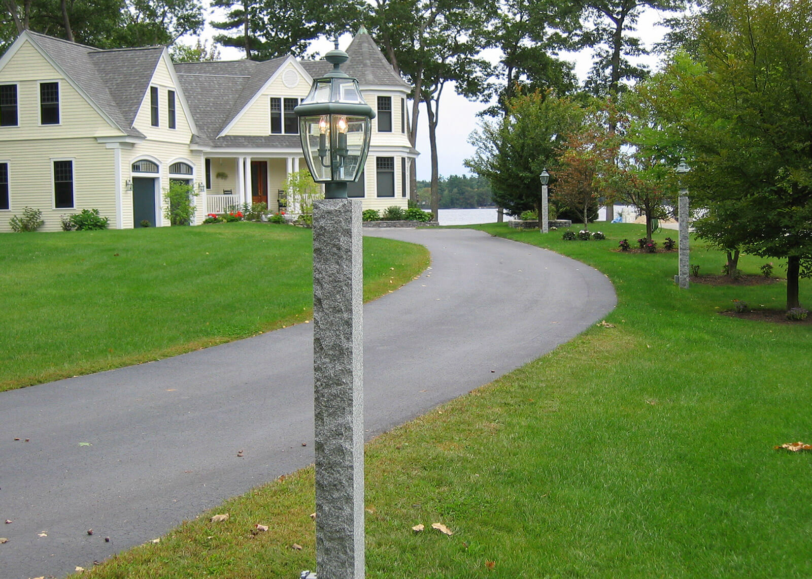 9 Ways to Light Up Your Landscape with Granite Lamp Posts | Swenson Granite | 100% Natural Stones